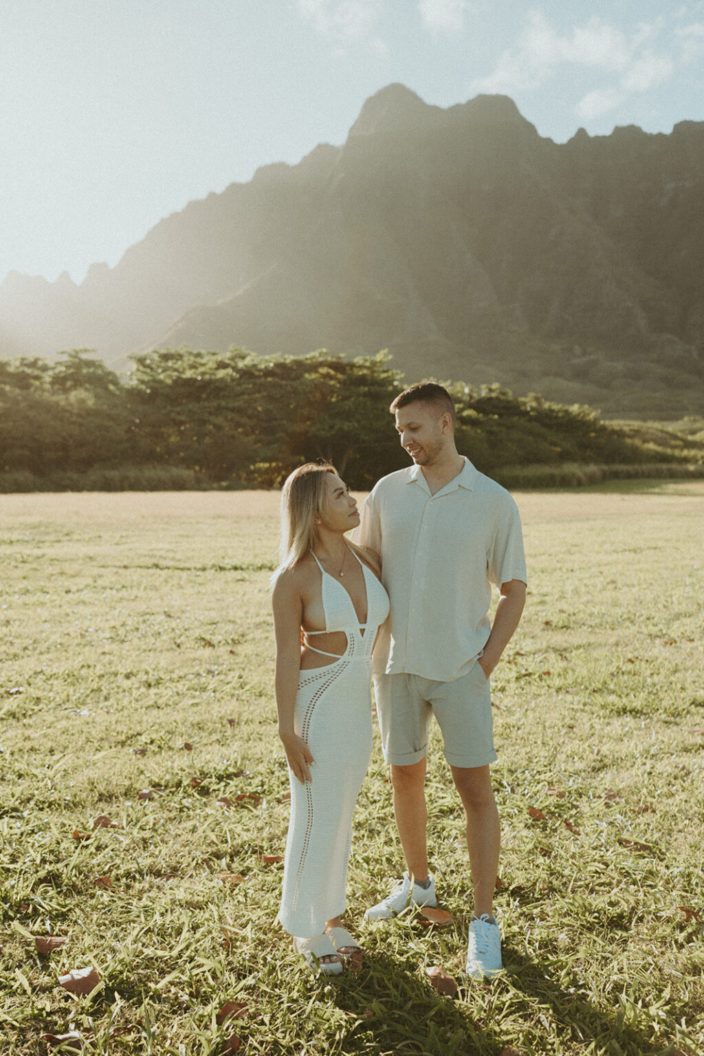 Playful Engagement Photos in Oahu at Kualoa Ranch